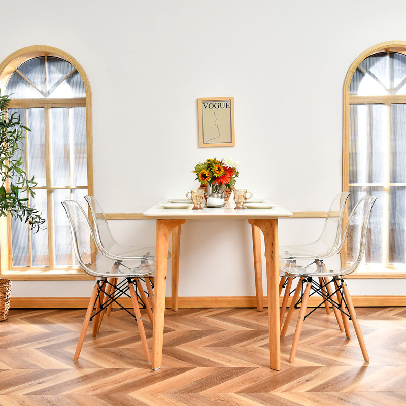 Corrigan Studio Anylia Set Of 4 Dining Chairs Modern Plastic Shell Side Chair W Clear Seat Wood Legs Wayfair